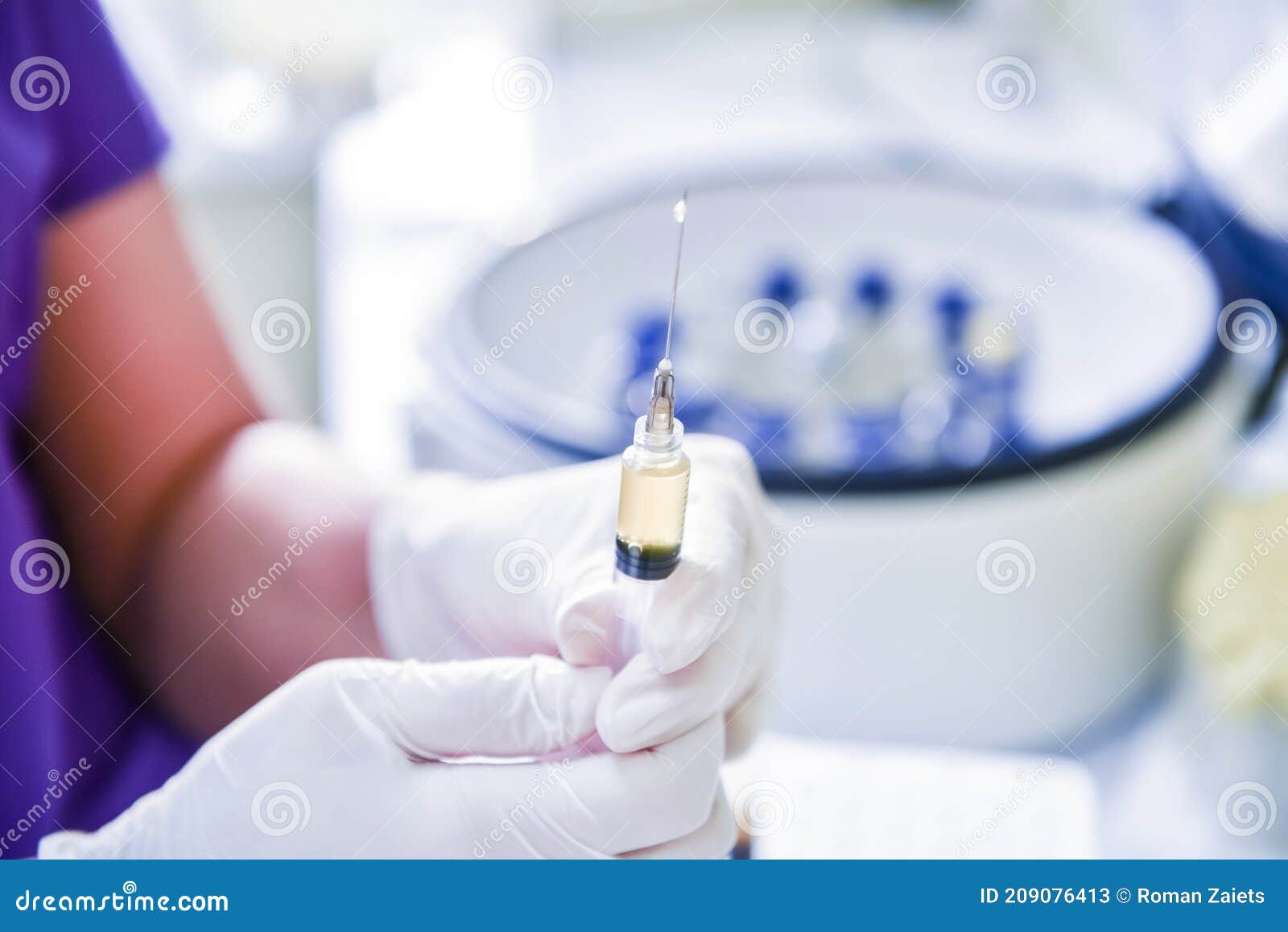 Platelet-Rich Plasma Preparation. Syringe with Plasma in Hands Stock ...
