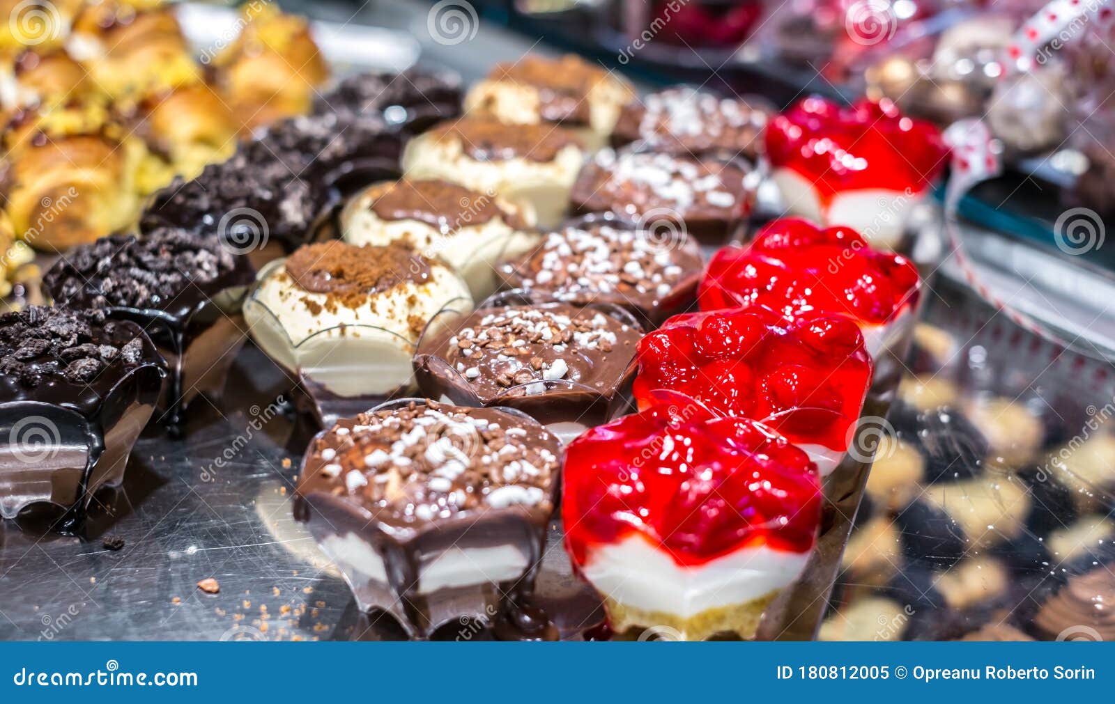 Plates with assorted cakes stock image. Image of delicious - 180812005