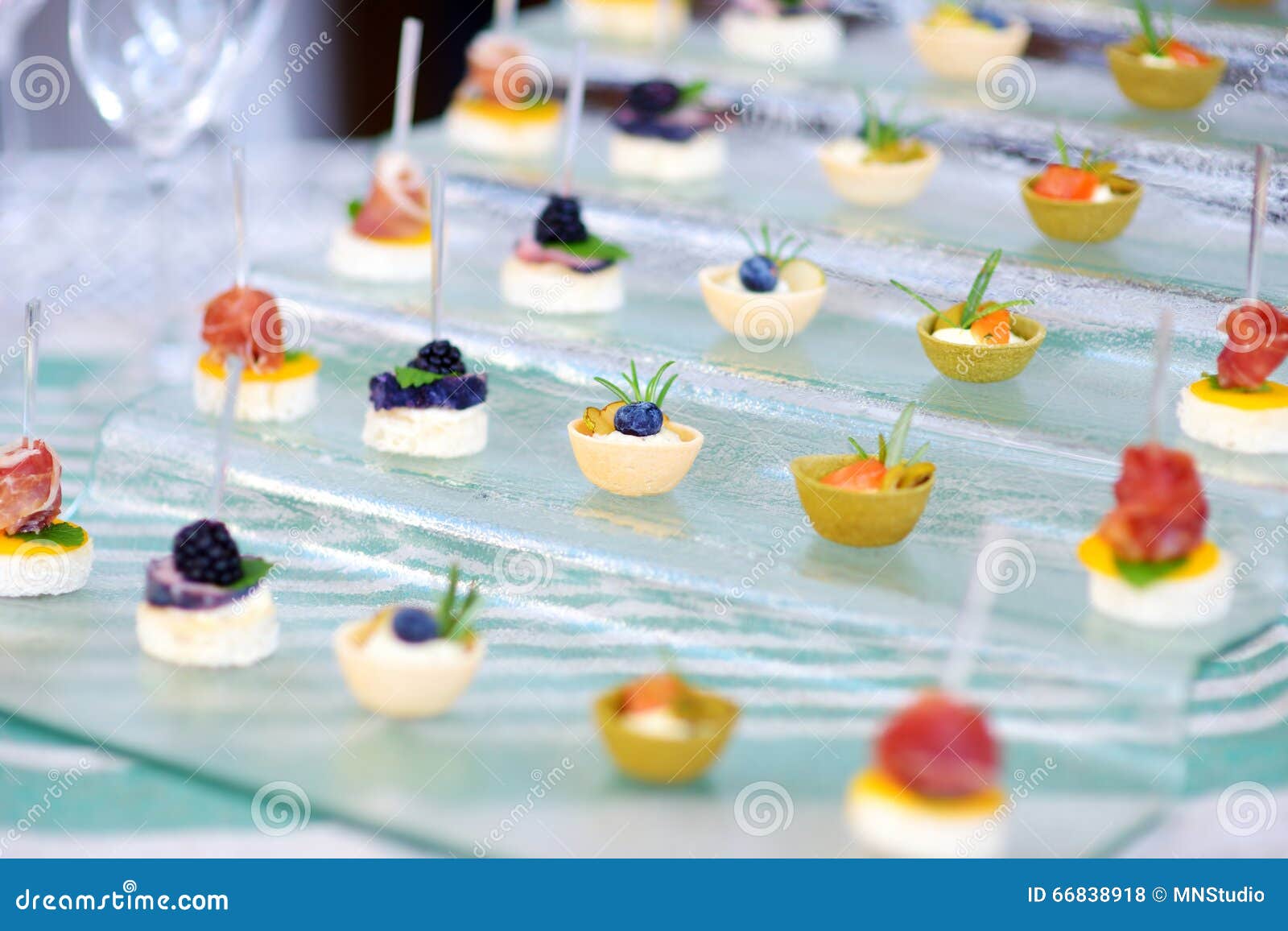 Plates with Assorted Finger Food Snacks on an Event Party or Dinner ...