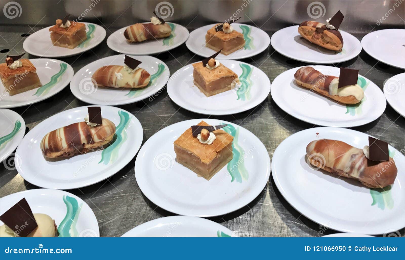 Dessert Buffet Assortment of Sweets on White Plates Stock Photo - Image ...