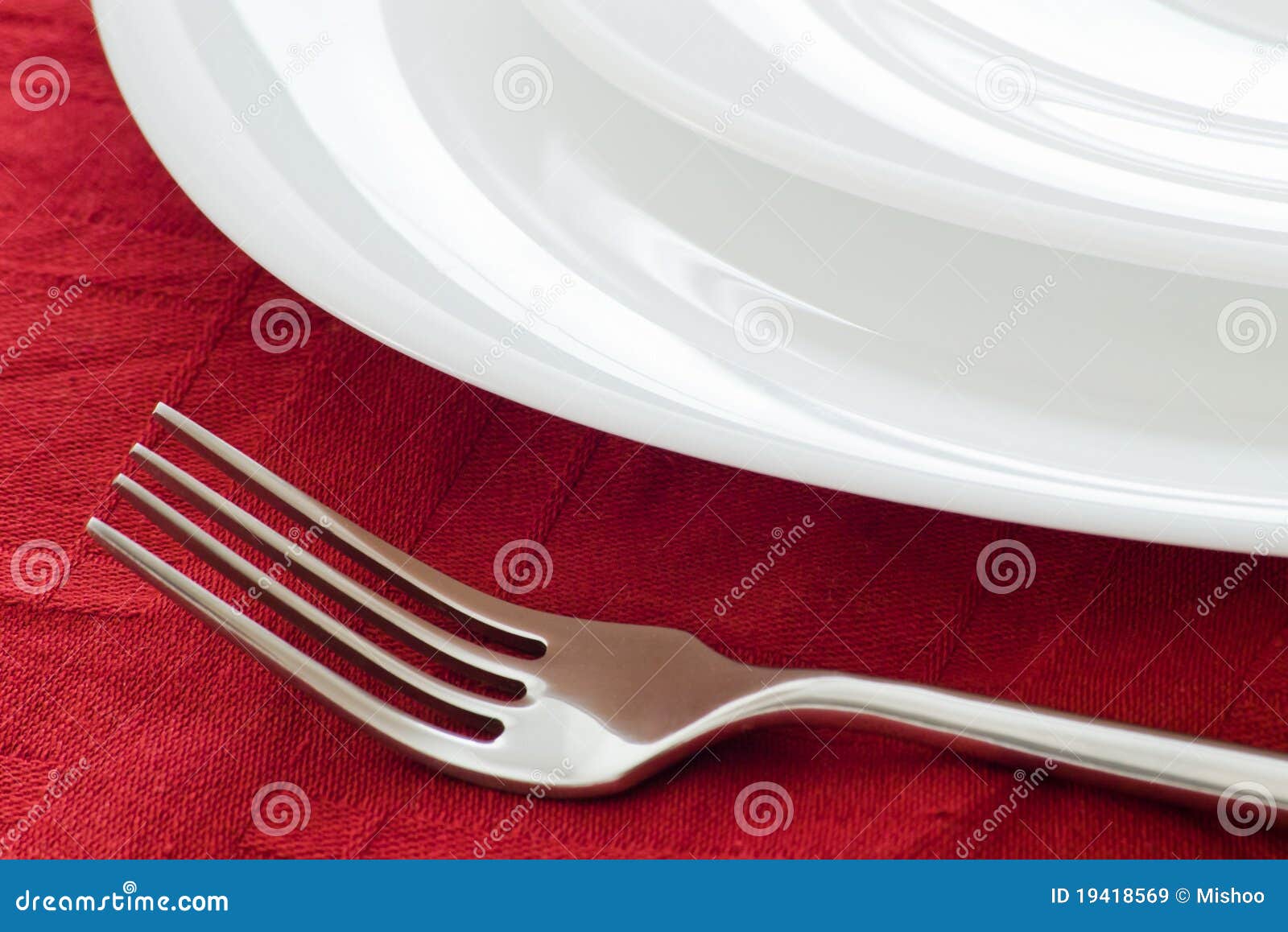 Plates and fork stock image. Image of dinner, dinnerware - 19418569