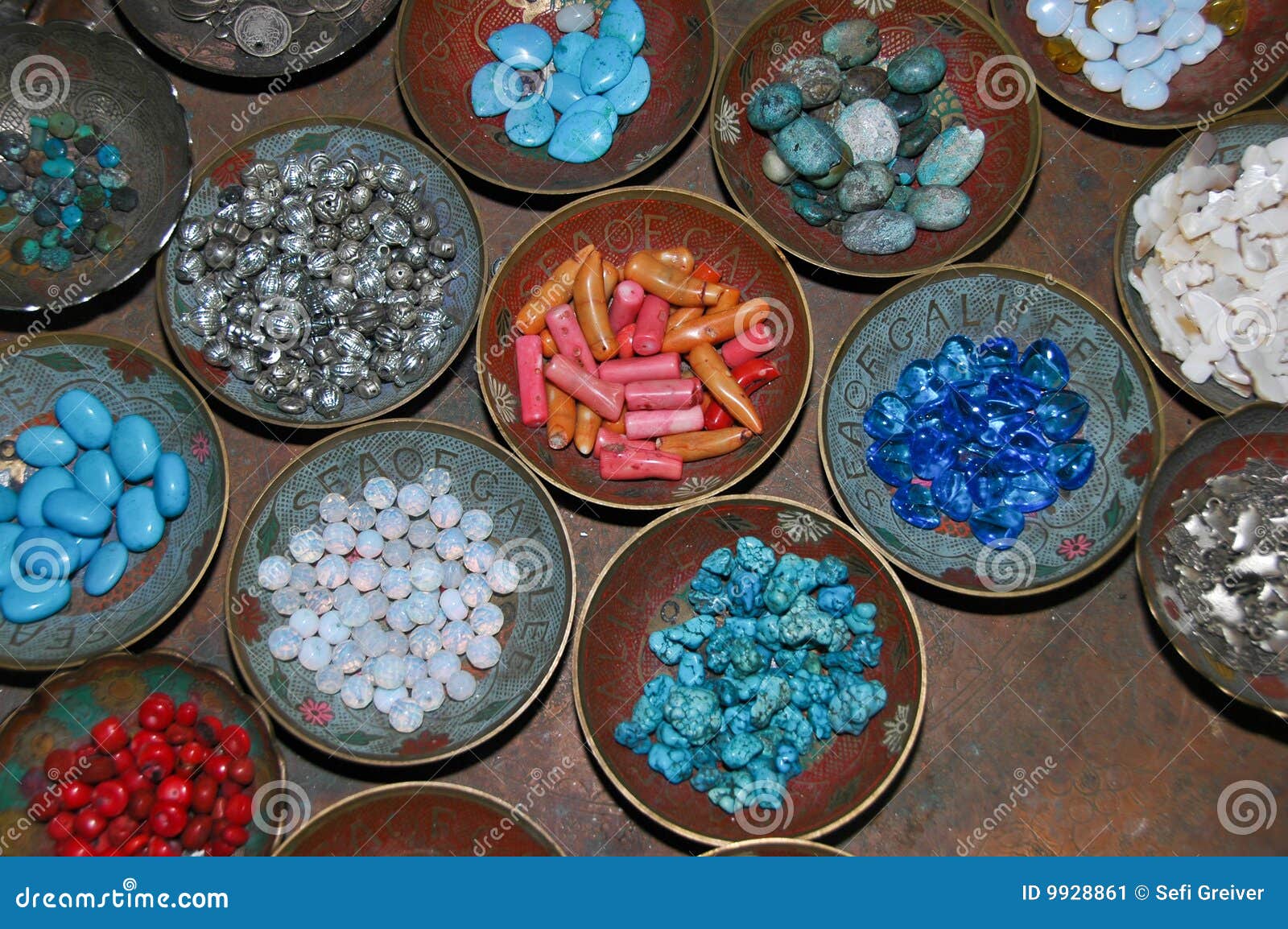 Plates Full of Stones stock image. Image of brown, color - 9928861