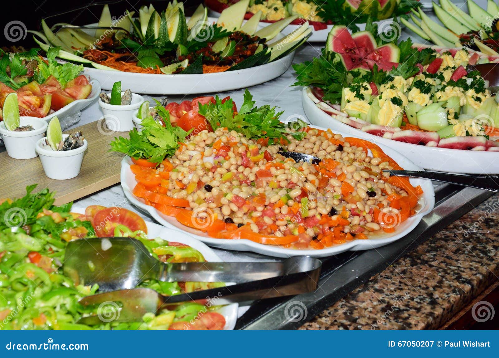 Plates of salad in buffet stock image. Image of lunch - 67050207