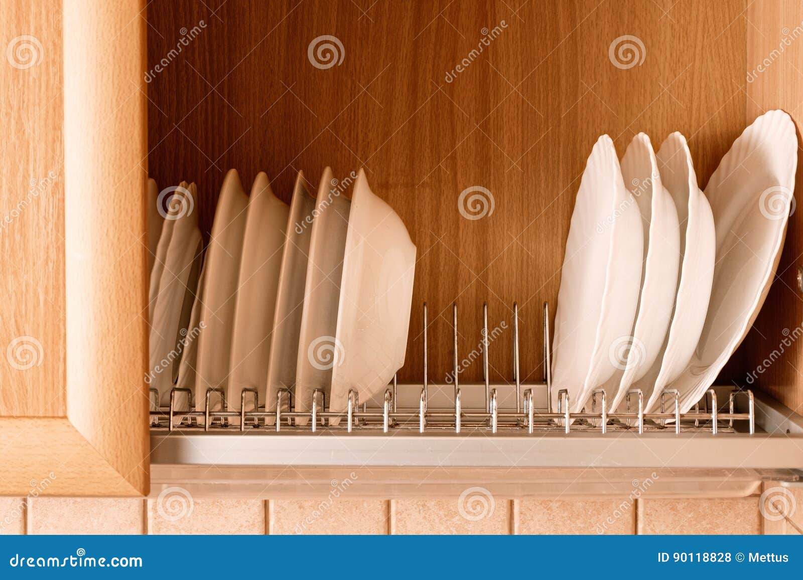 Plates on shelf in kitchen stock photo. Image of food - 90118828