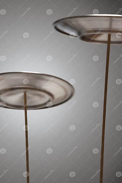Plates Spinning on Sticks stock image. Image of motion - 30845363