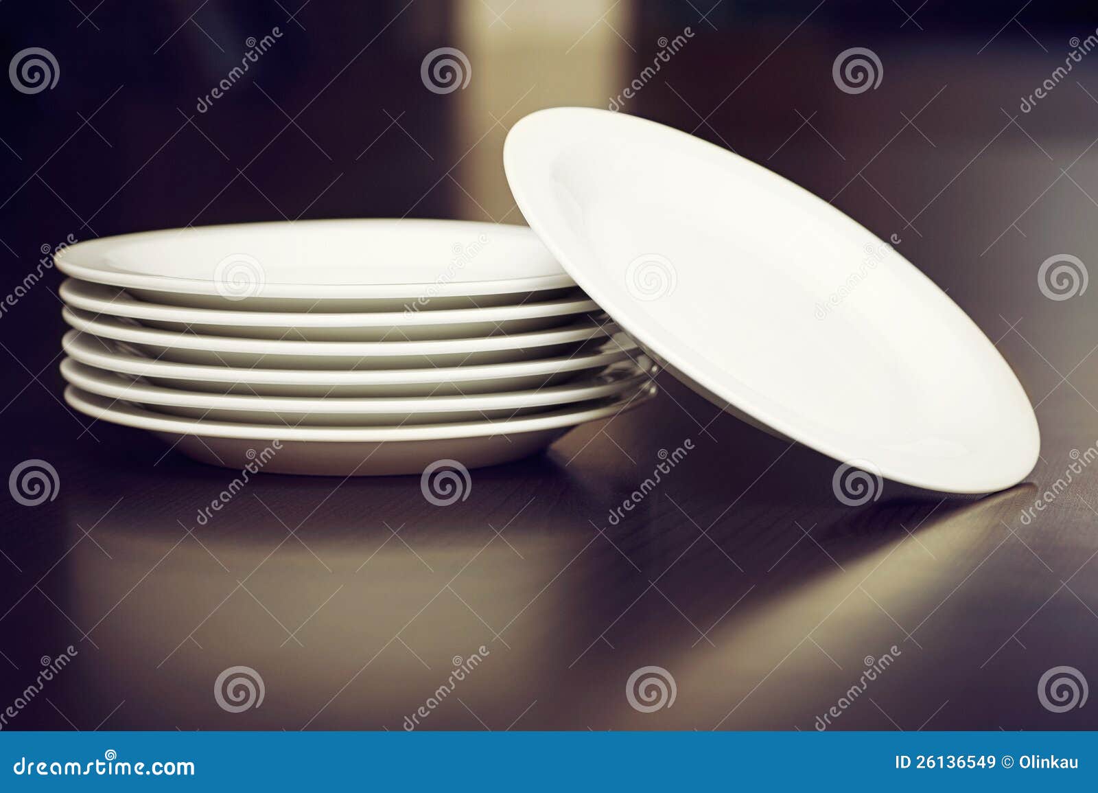 Plates on a table stock image. Image of crockery, heap - 26136549