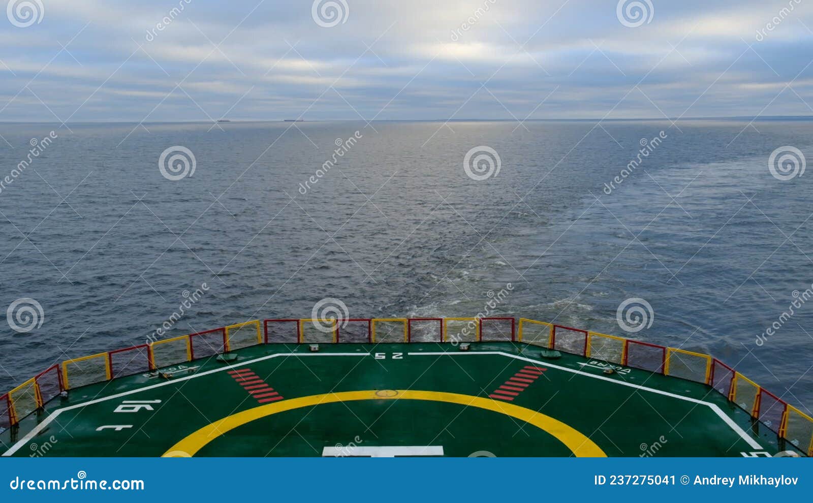 A Platform for a Helicopter on a Ship. Against the Background of the ...