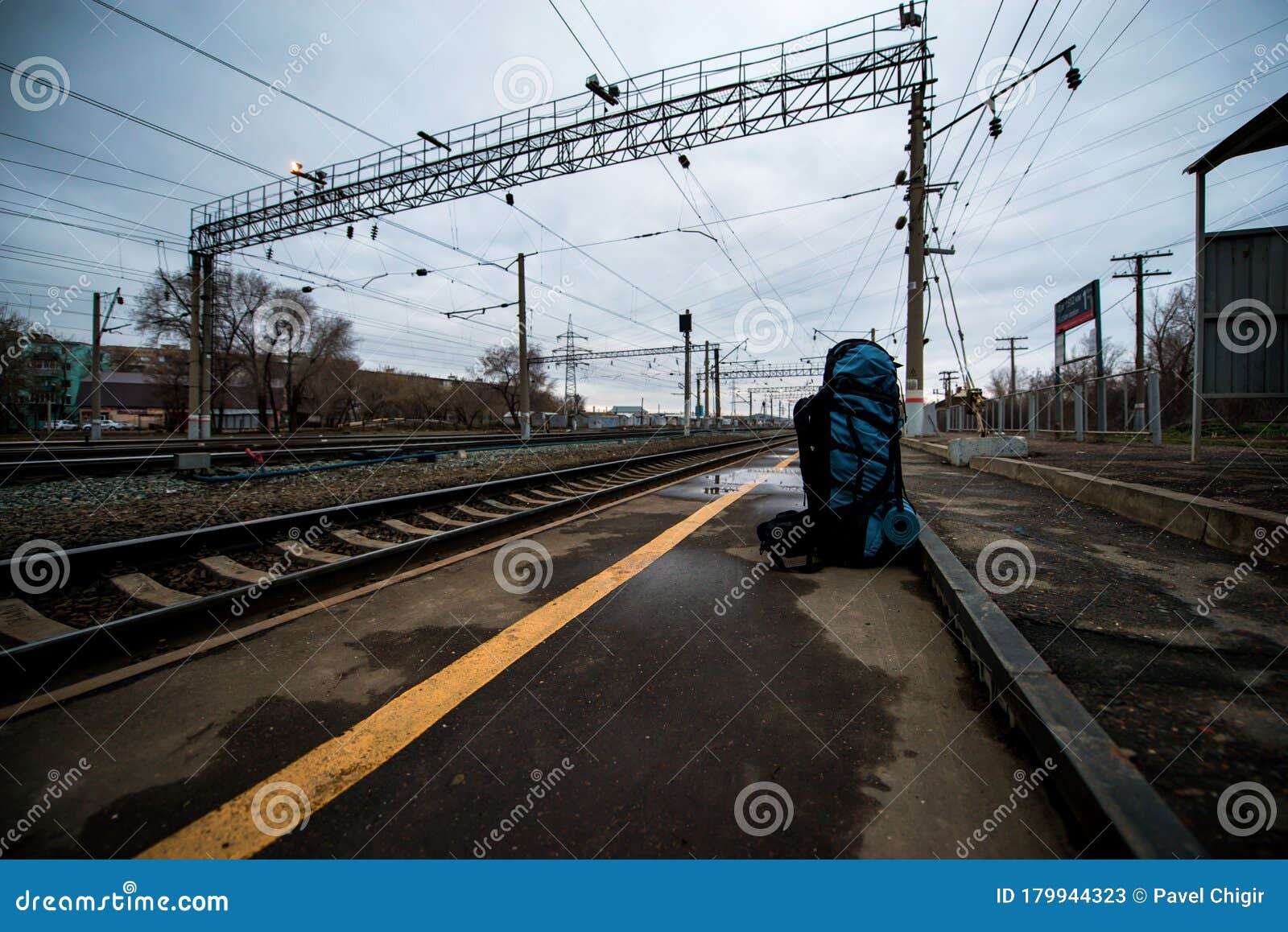 The Platform of the Railway Station, Trains, Travel Backpack is on the ...