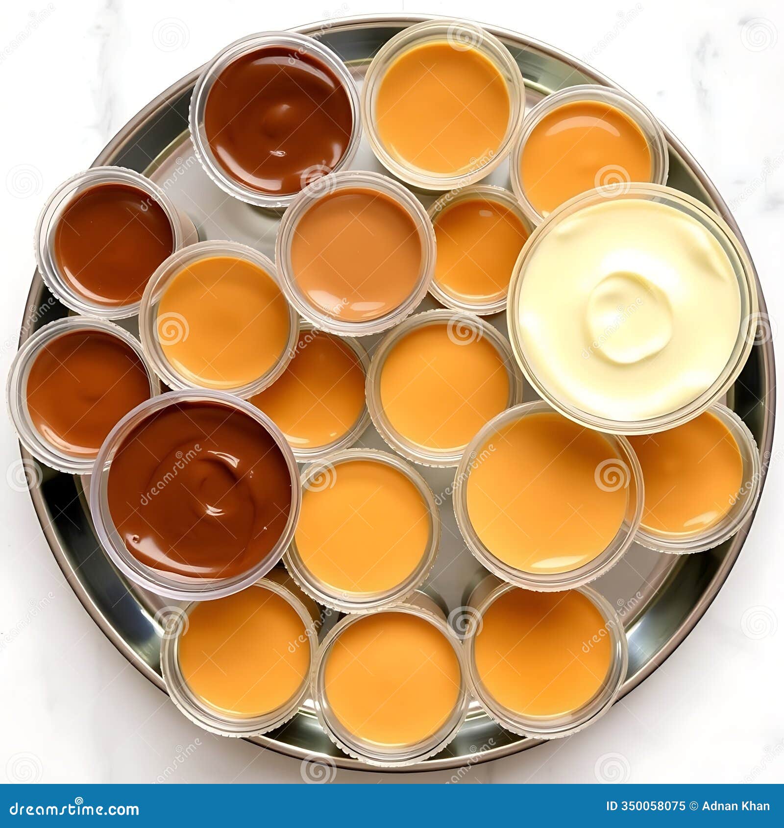 A Platter of Assorted Pudding Cups with Flavors Like Chocolate, Vanilla ...