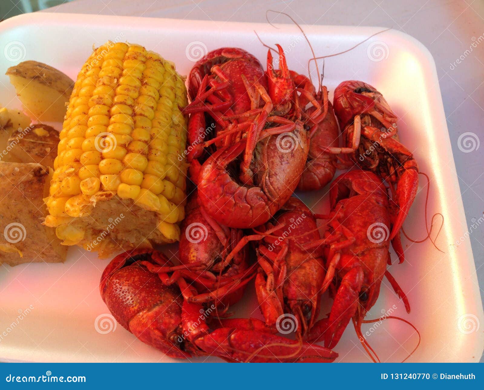 Platter of Boiled Crawfish with Boiled Corn Stock Photo - Image of ...