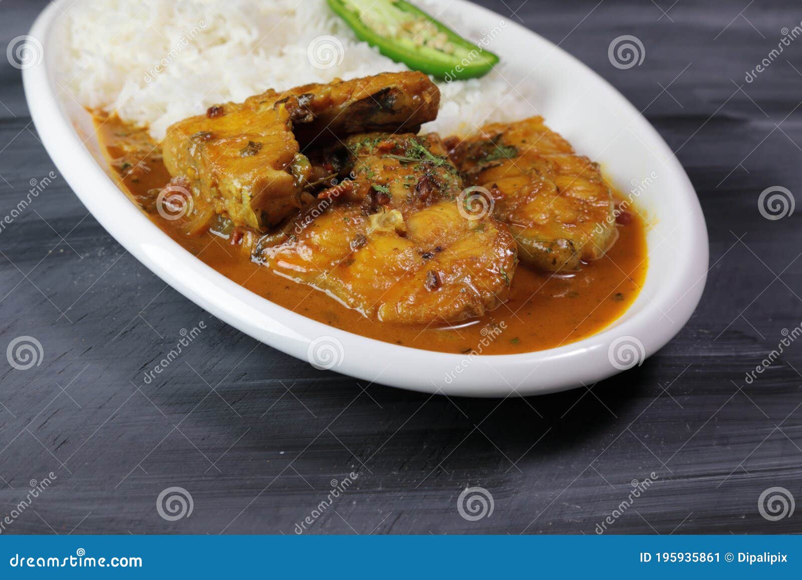 A Platter of North Indian Style Fish Curry with Rice Stock Image ...