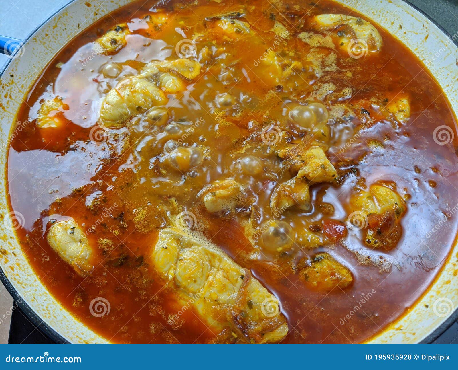 A Platter of North Indian Style Fish Curry with Rice Stock Photo ...