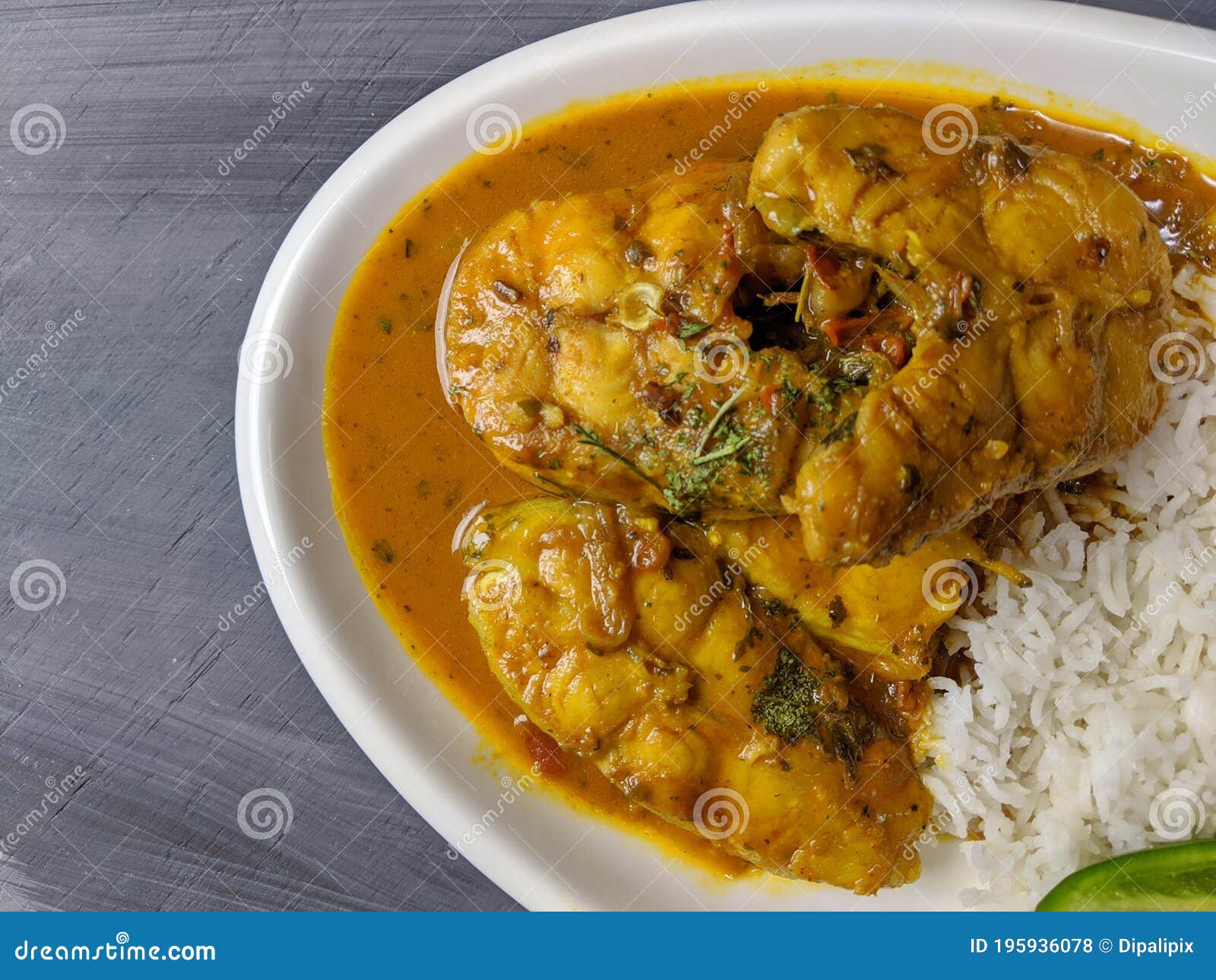 A Platter of North Indian Style Fish Curry with Rice Stock Photo ...