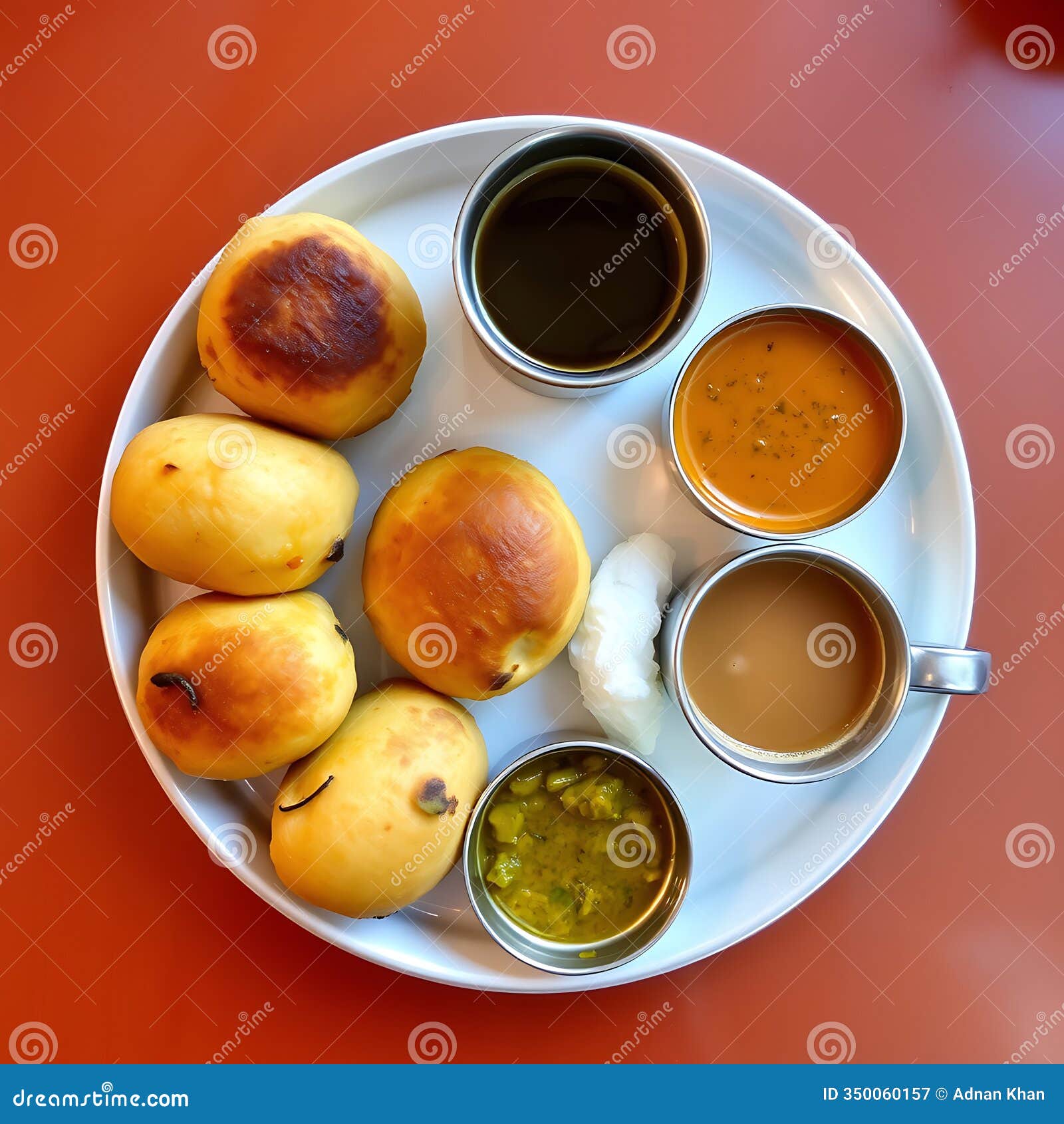 A Platter of Vada, Sambar, and Chutney with a Cup of Filter Coffee on a ...