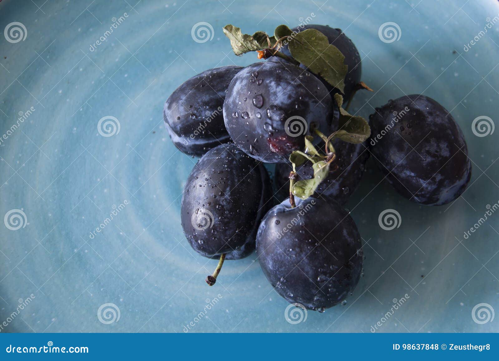 Plaums on the plate indoor stock photo. Image of healthy - 98637848