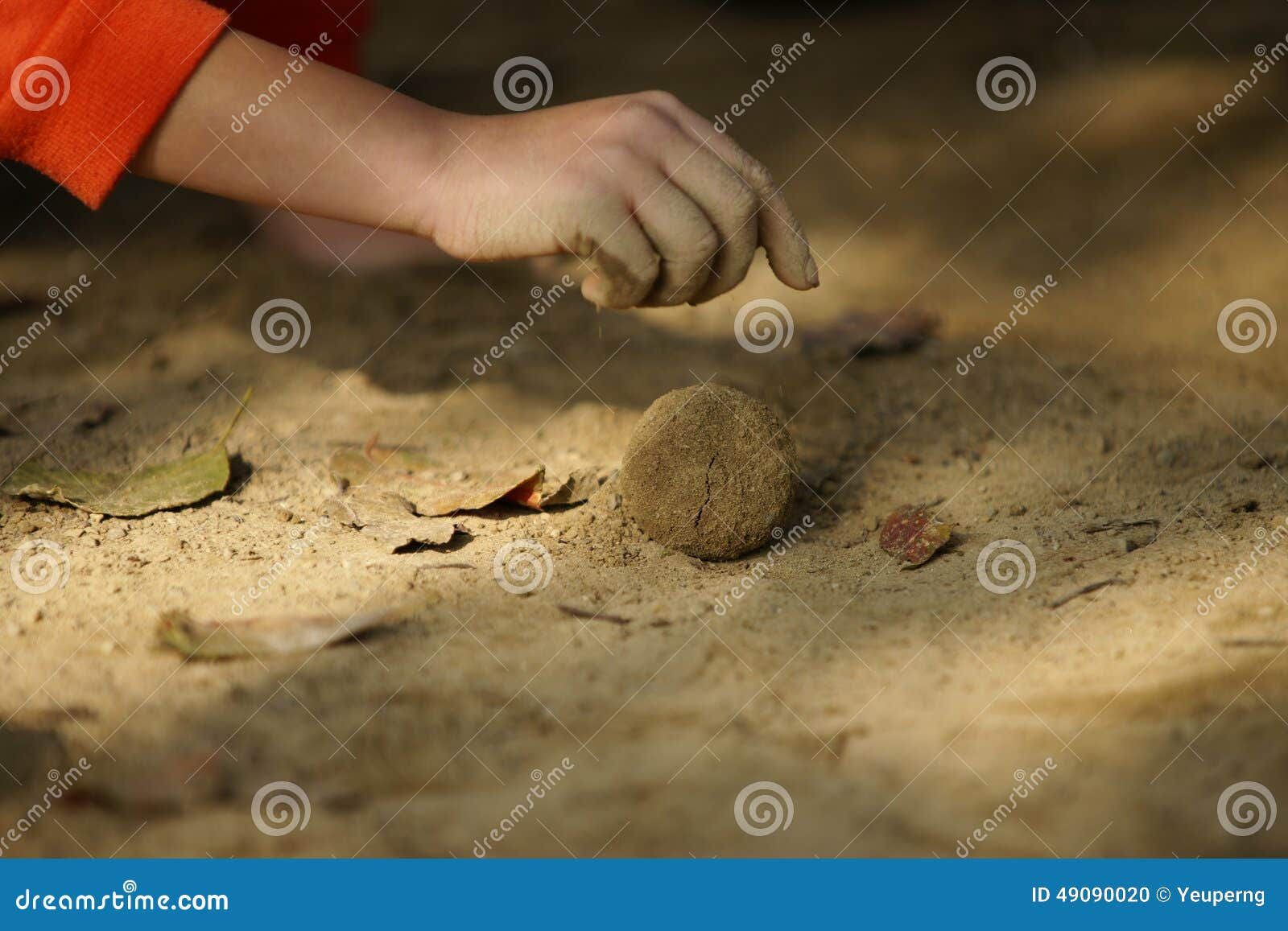 Play ball of mud. stock photo. Image of sunlight, outdoor - 49090020