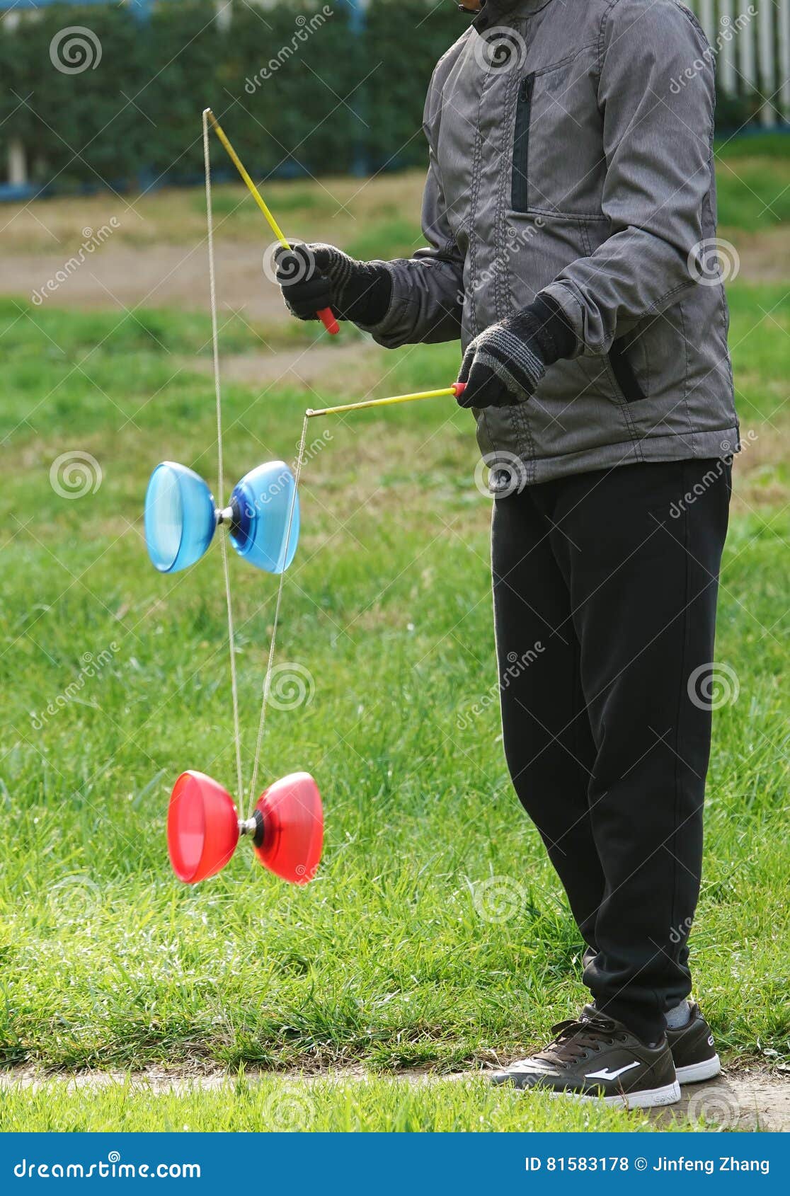 Play diabolo stock photo. Image of blue, person, grass - 81583178