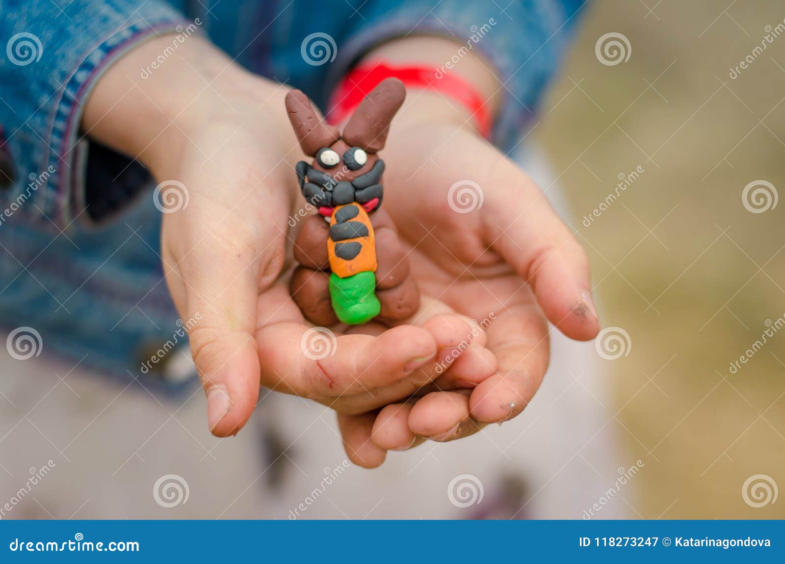 Play dough art in hands stock image. Image of hand, detail - 118273247