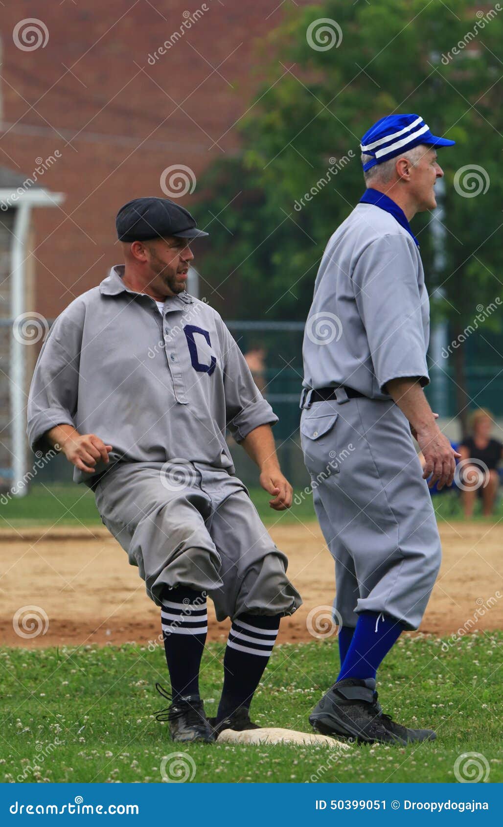 Play at first base editorial photo. Image of event, action - 50399051