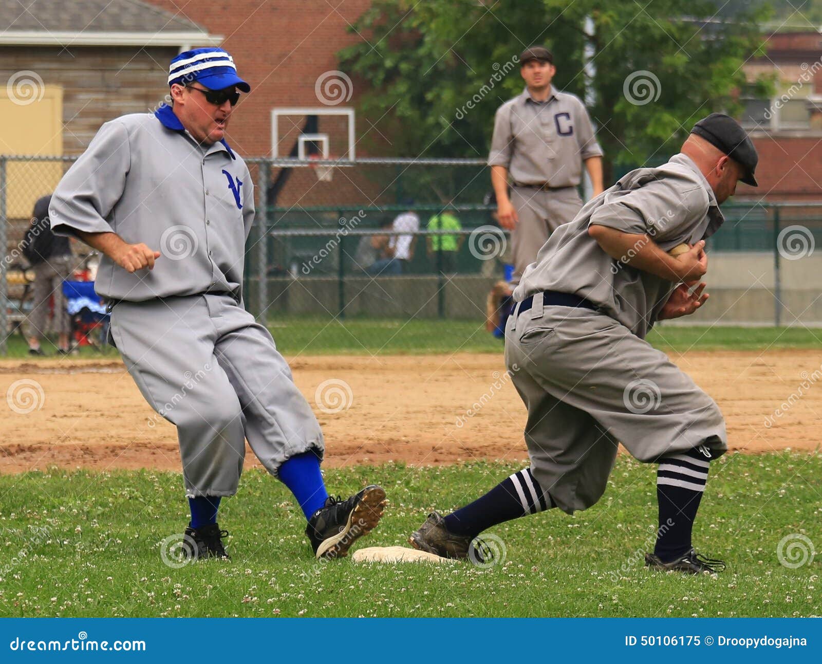 Play at first base editorial image. Image of running - 50106175