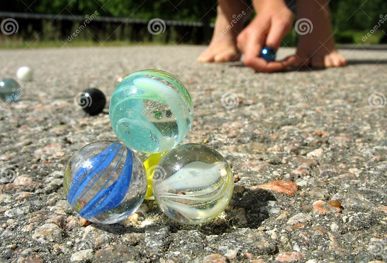 Play marbles 1 stock image. Image of stones, glass, summer - 2536549