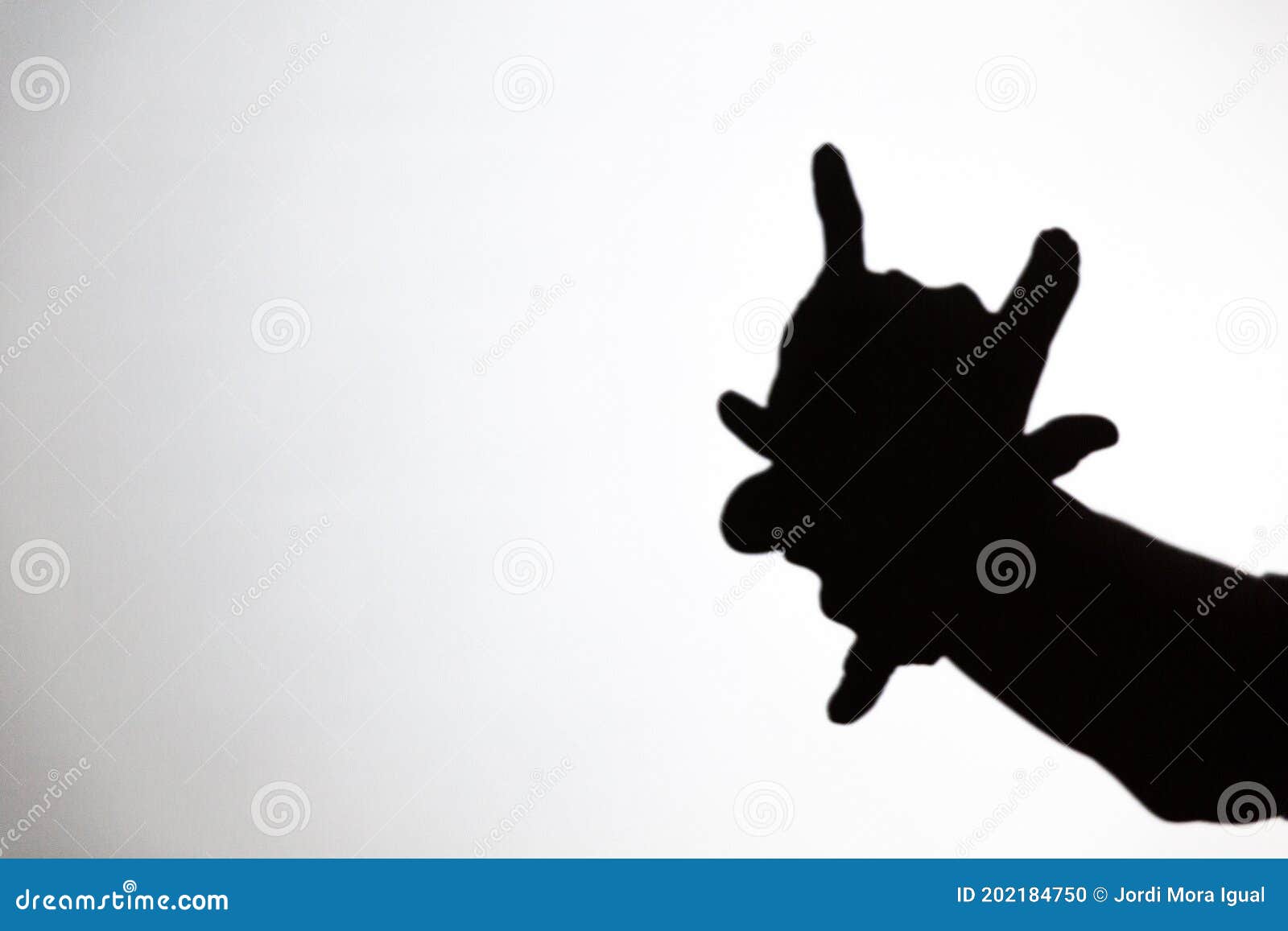 Play Shadow Projected Against a White Background, a Demon Stock Photo ...