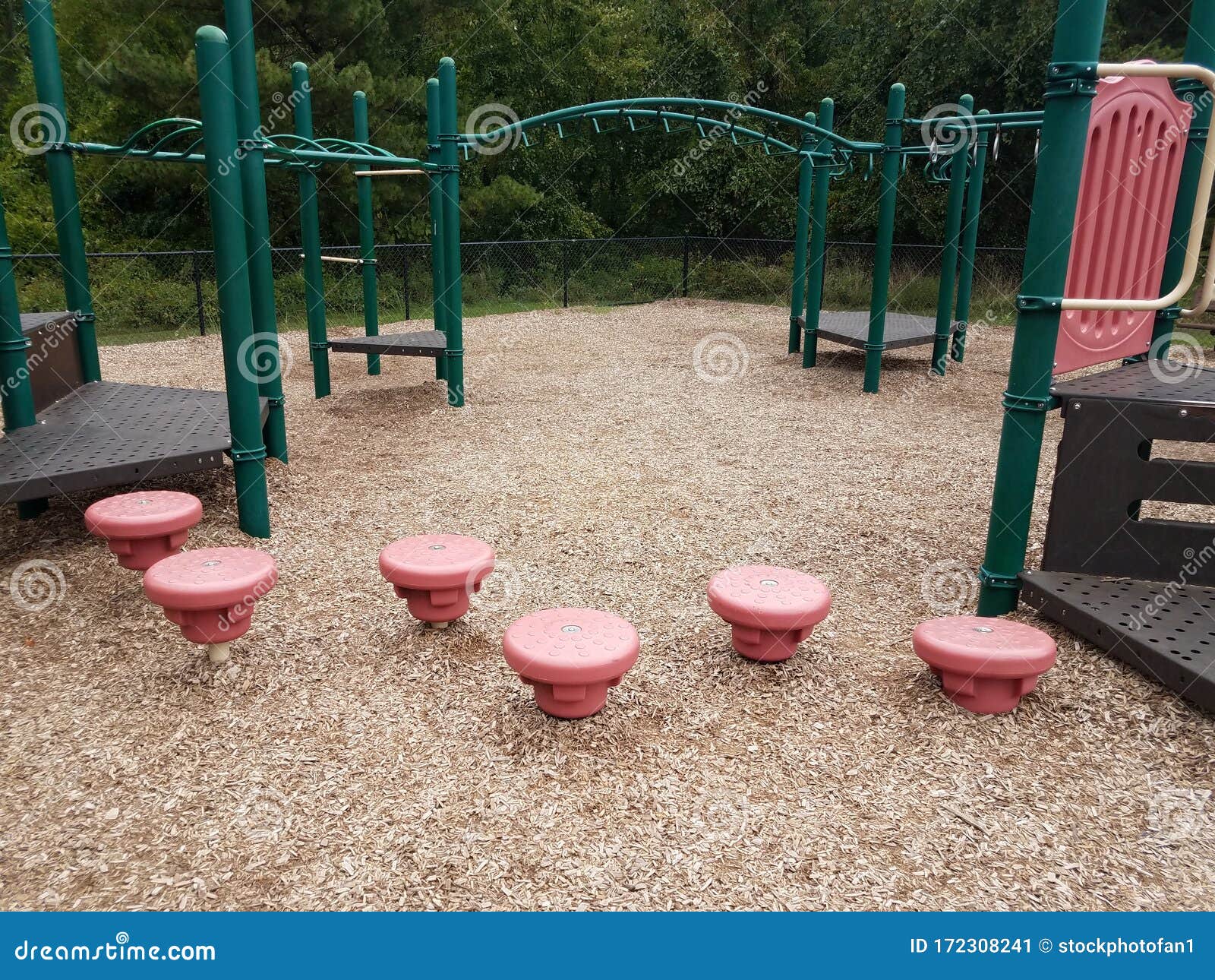 Play Structure with Green Bars and Red Stepping Stones Stock Image ...