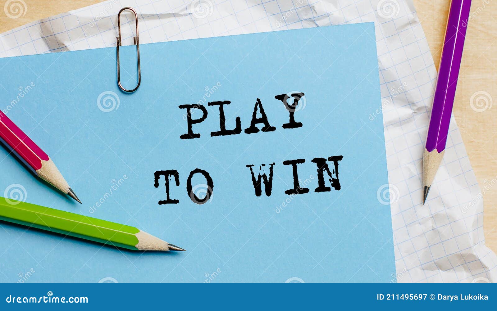 PLAY TO WIN Text Written on a Paper with Pencils in Office Stock Image ...
