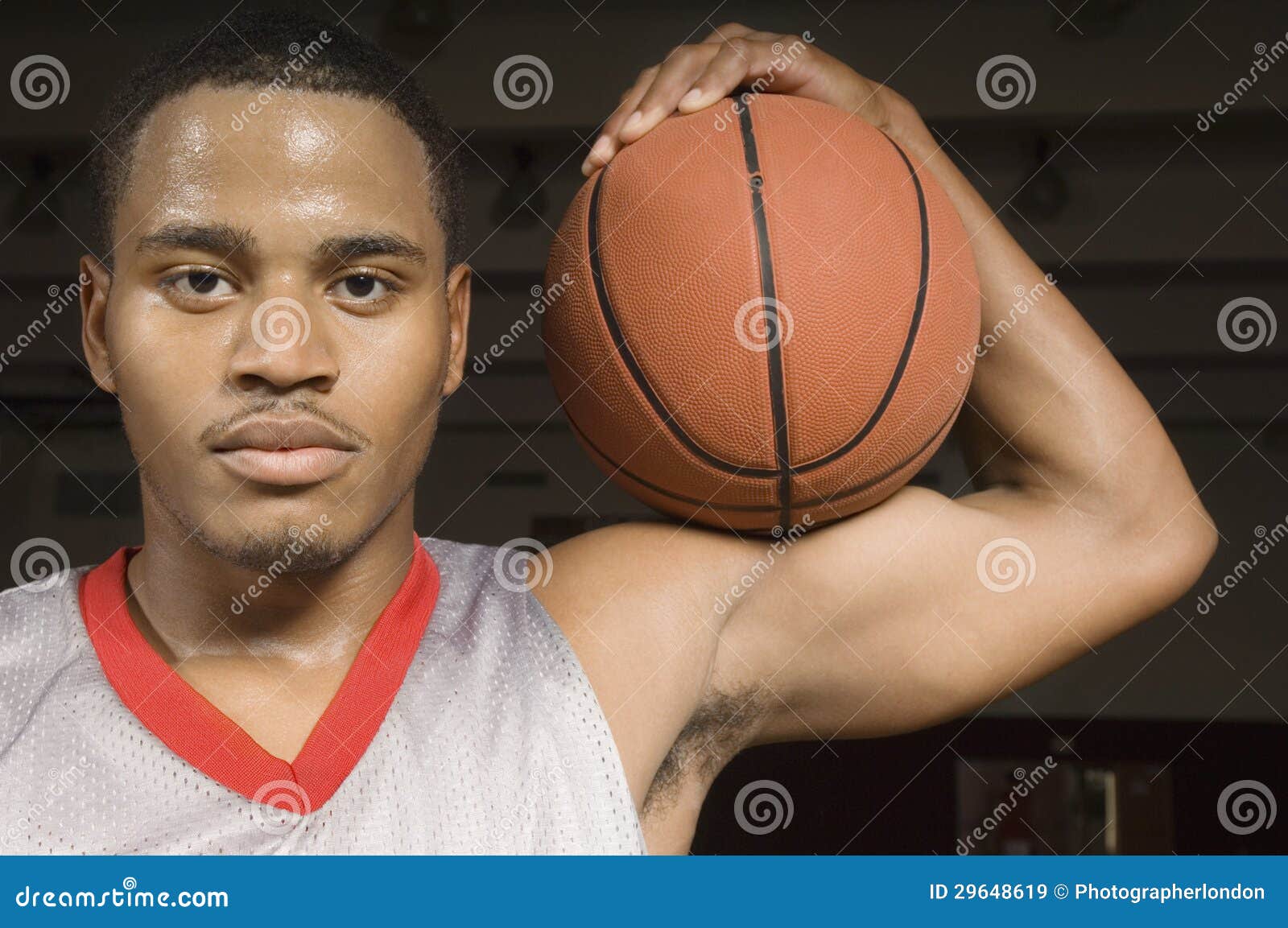 Player Holding Basketball on His Muscle Stock Image - Image of african ...