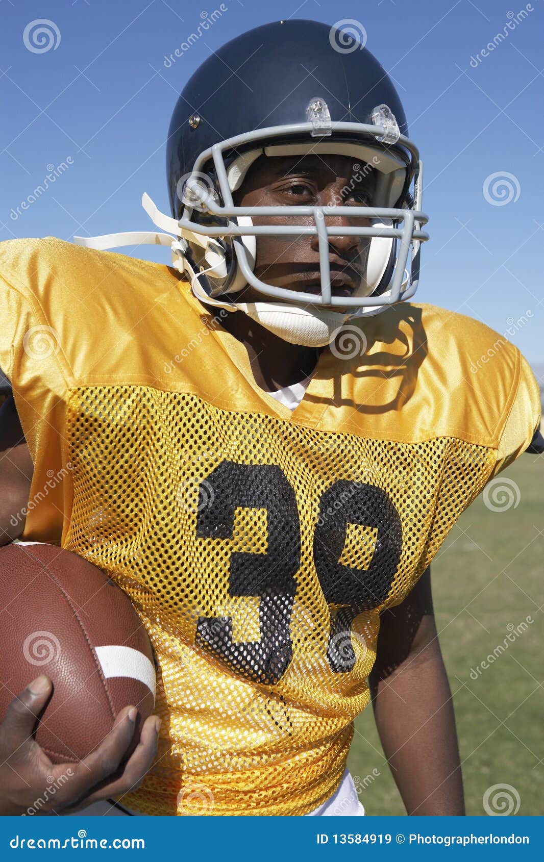 Player Holding Football stock image. Image of adult, sport - 13584919