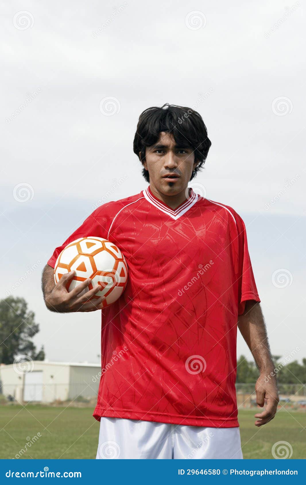 Player Holding a Football stock photo. Image of player - 29646580