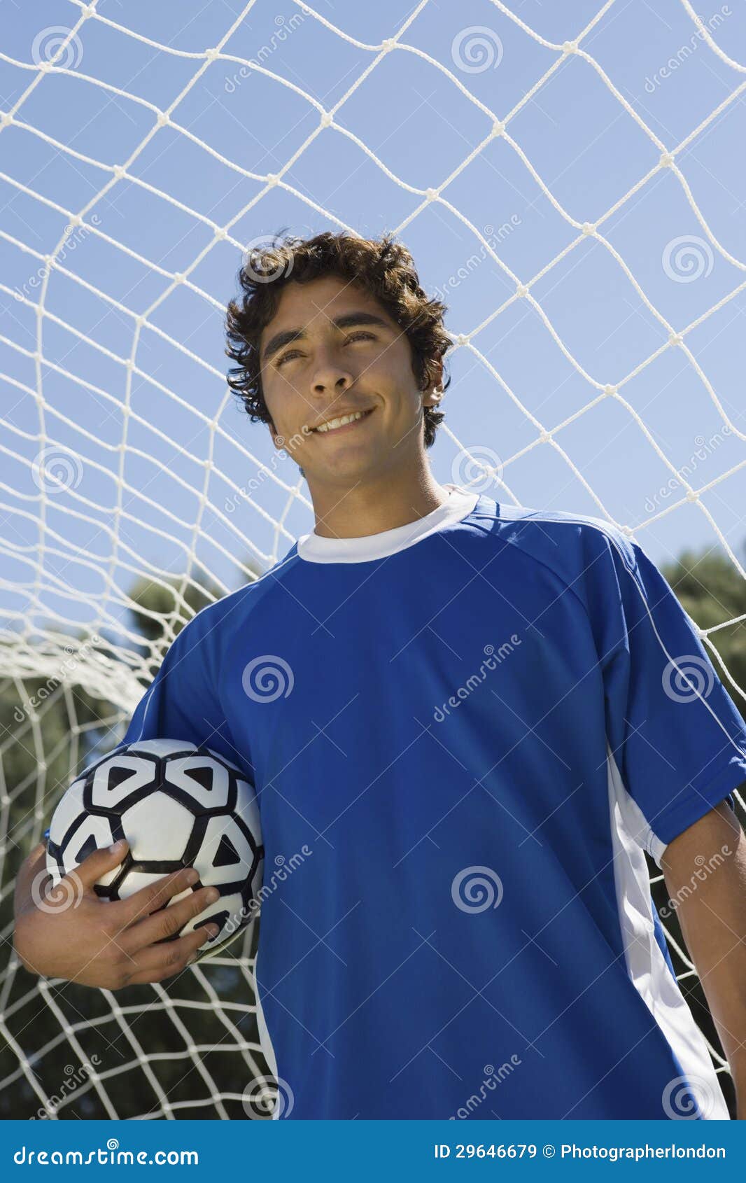 Player Holding Football stock image. Image of athletic - 29646679