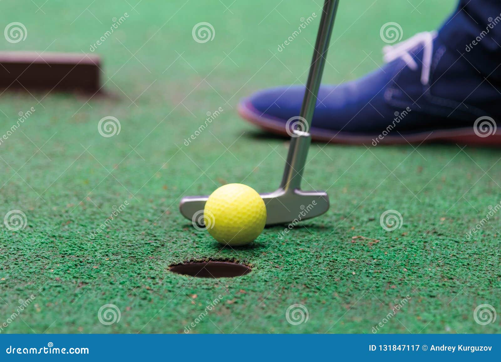 Player Makes a Decisive Blow in the Game of Mini Golf Stock Image ...