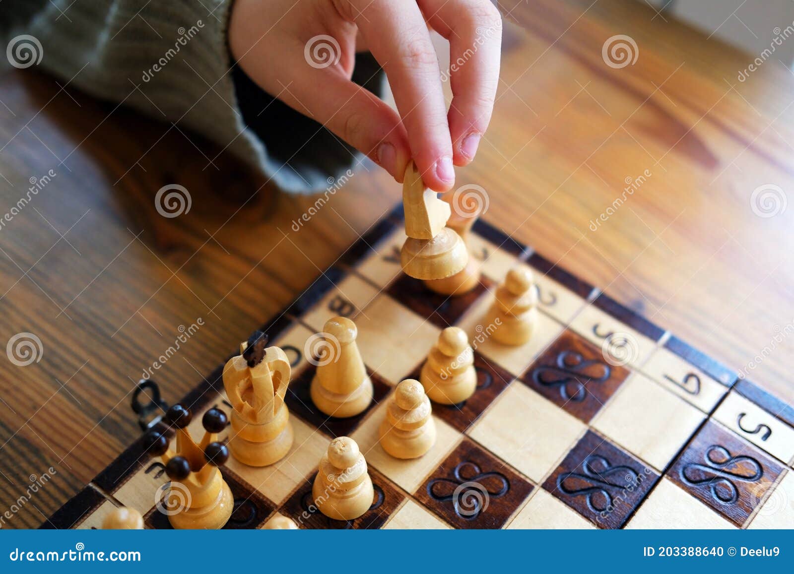 A Player Playing Chess on the Chessboard - Top View Stock Photo - Image ...