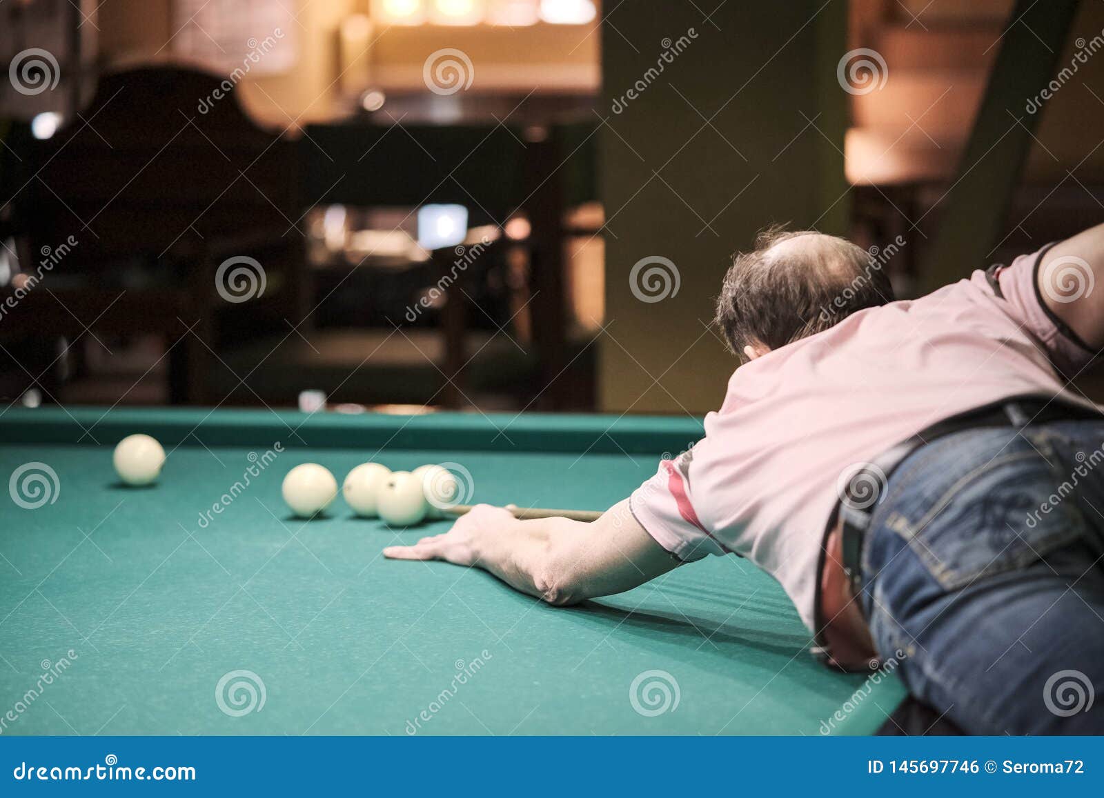 The Player Takes Aim at the Ball in Billiards Stock Photo - Image of ...