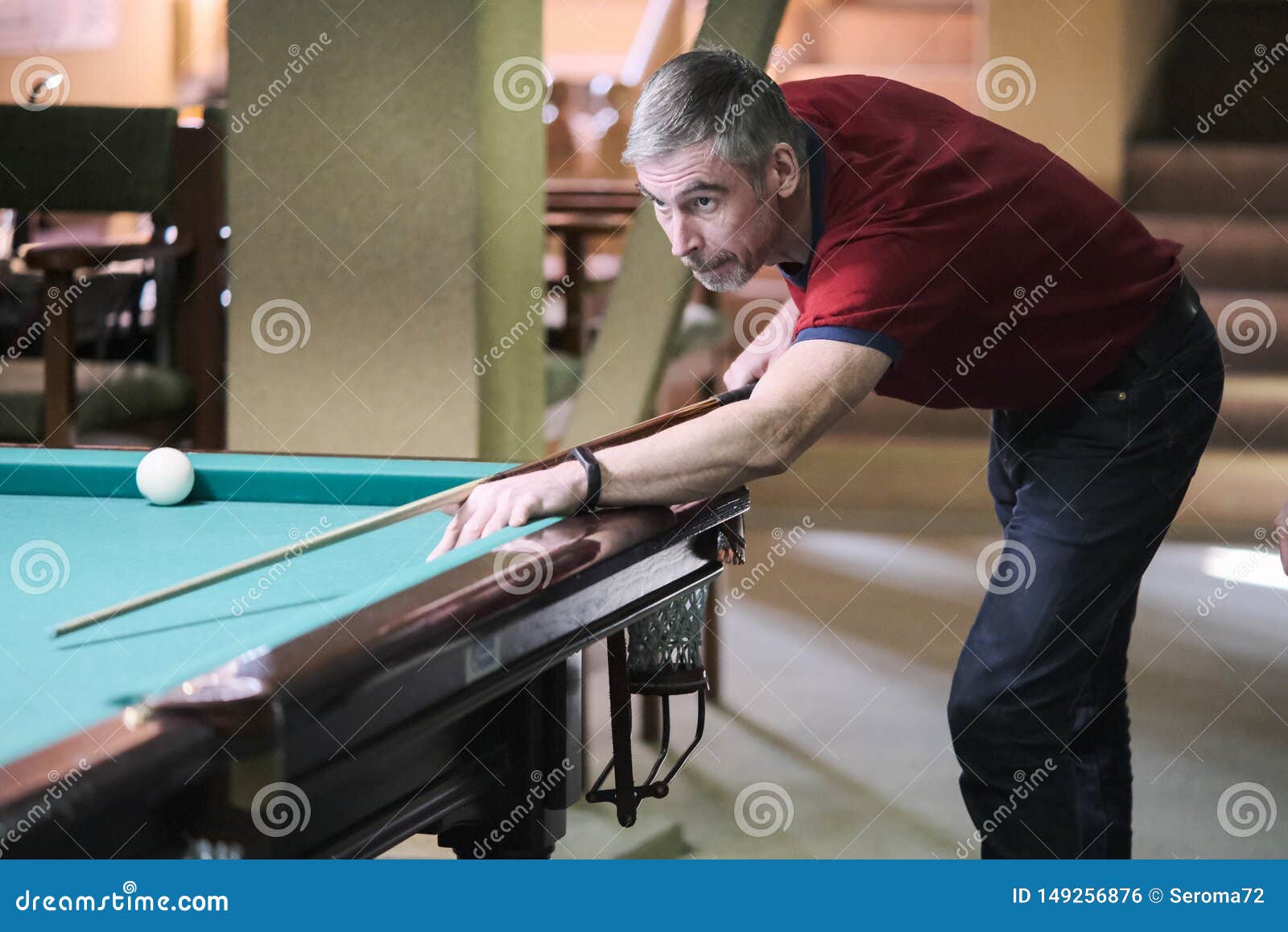 The Player Takes Aim at the Ball in Billiards Stock Photo - Image of ...