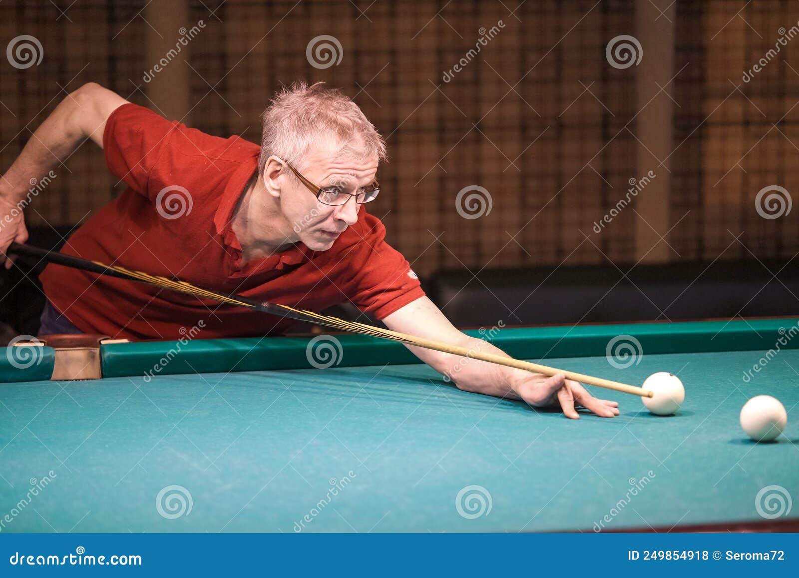 The Player Takes Aim at the Ball in Billiards Stock Photo - Image of ...