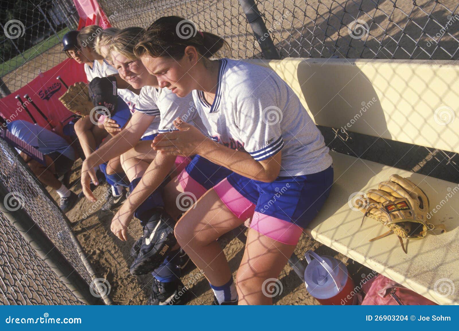 Players cheering on bench editorial stock image. Image of states - 26903204