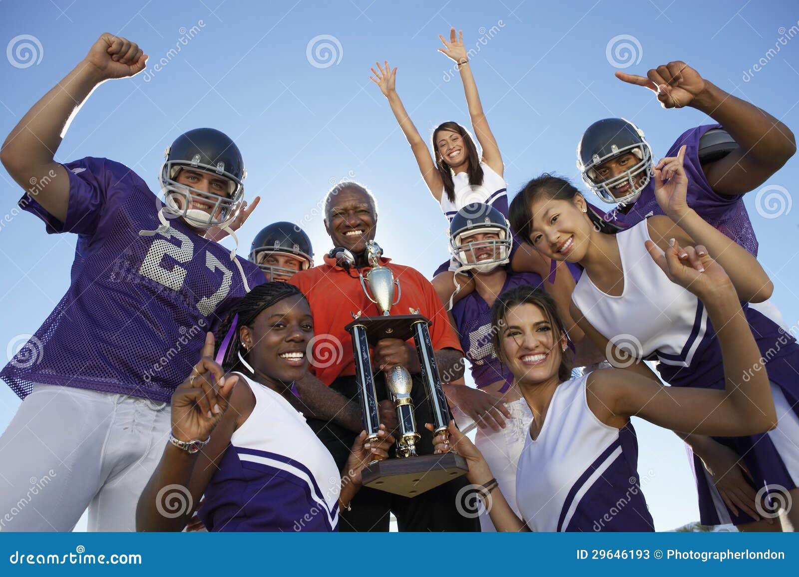 Players and Coach Holding Trophy Stock Image - Image of adult, holding ...