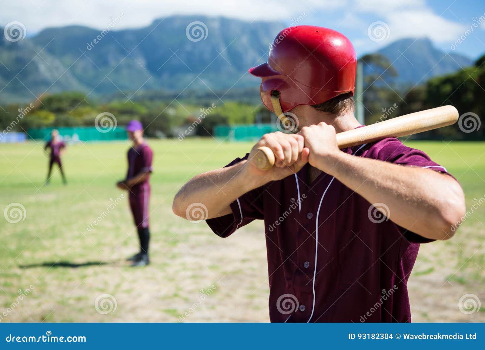 Players Playing Baseball on Field Stock Photo - Image of adult ...