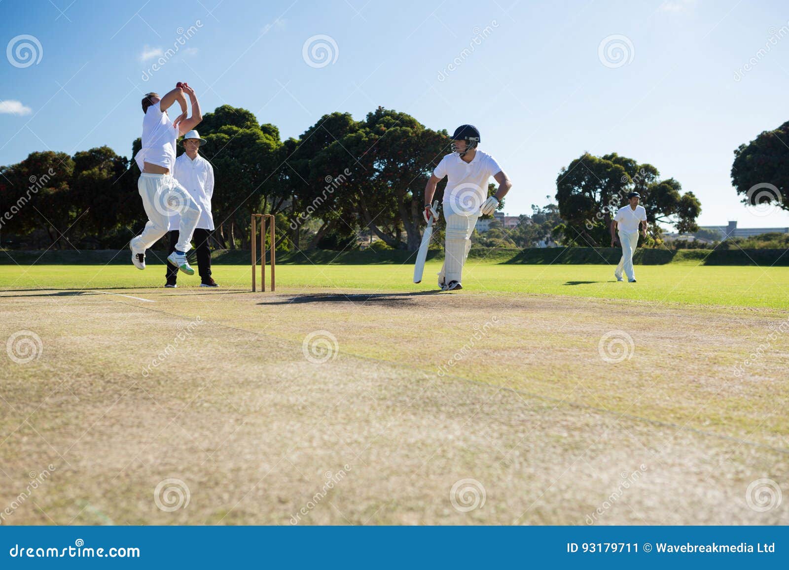 Players Playing Cricket Match at Field Stock Image - Image of athlete ...