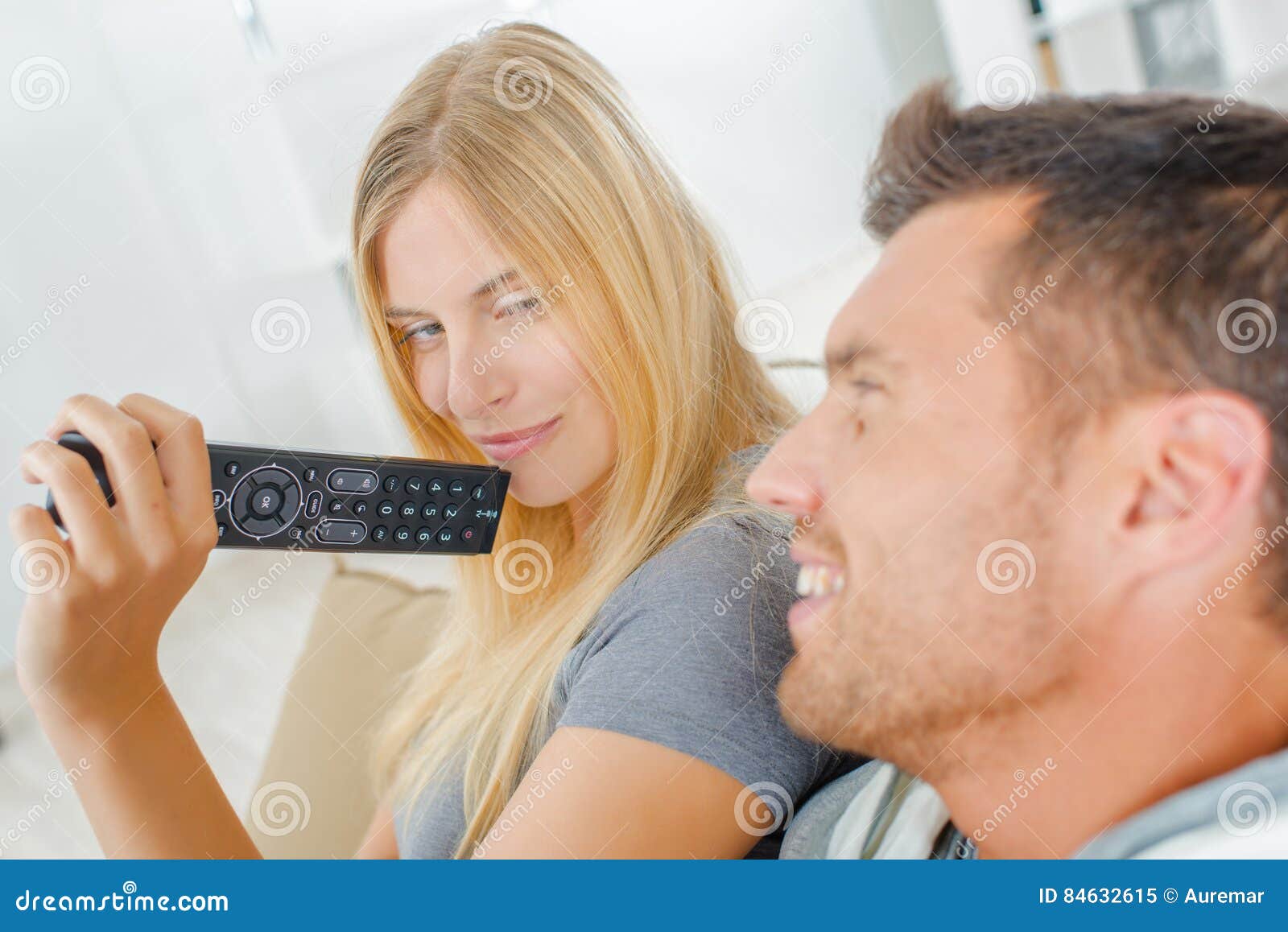 Playful Couple Fighting Over TV Remote Stock Image - Image of pain ...