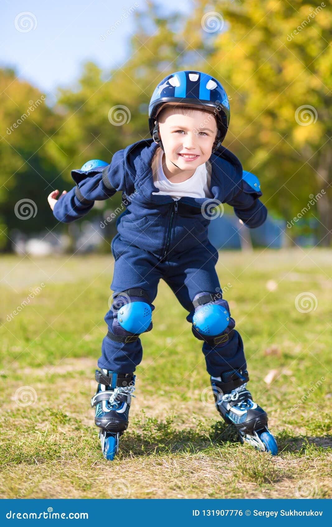 Playful little boy stock photo. Image of knee, childhood - 131907776