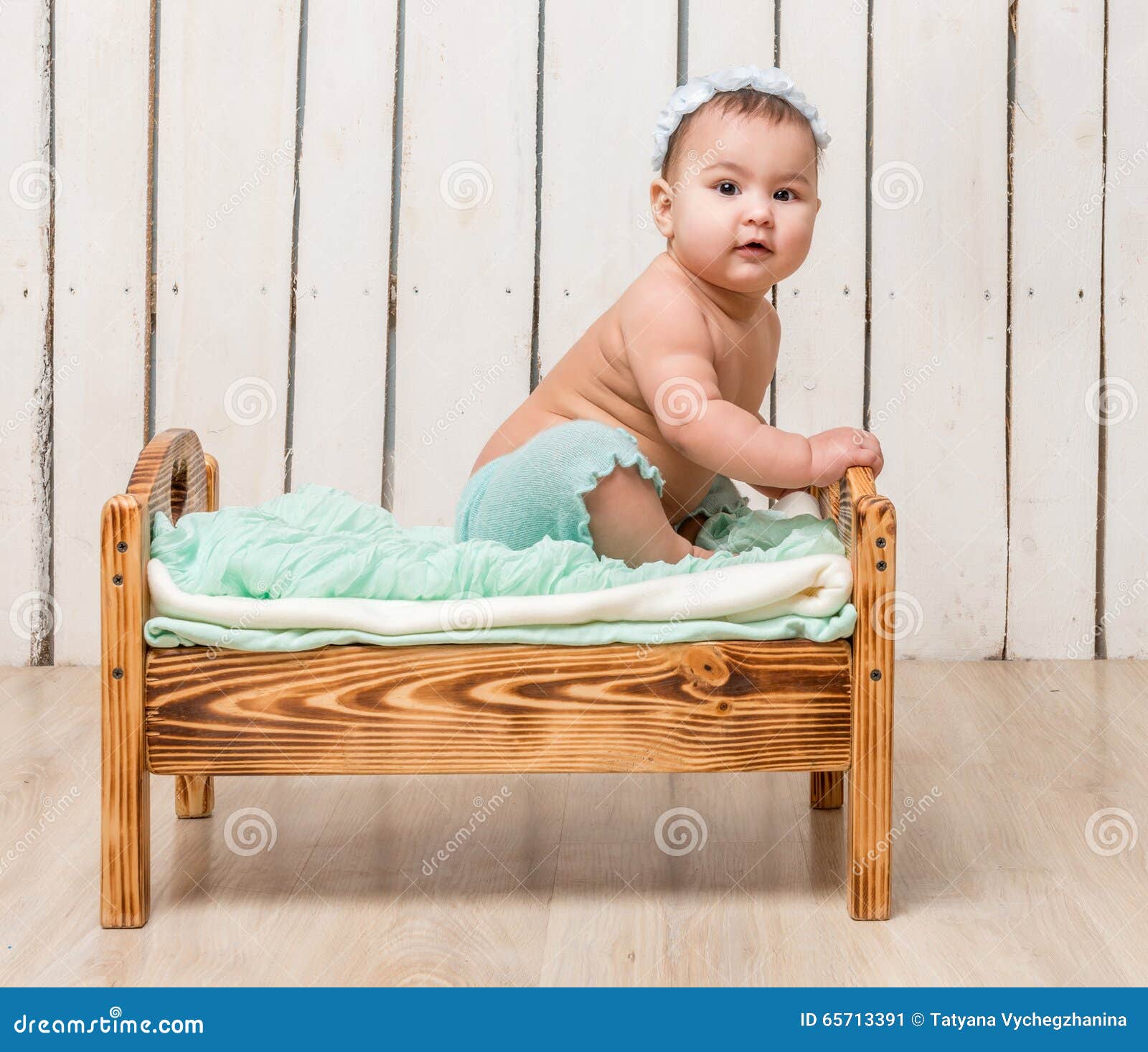 Playful Little Child Sitting on a Cot Stock Image - Image of little ...