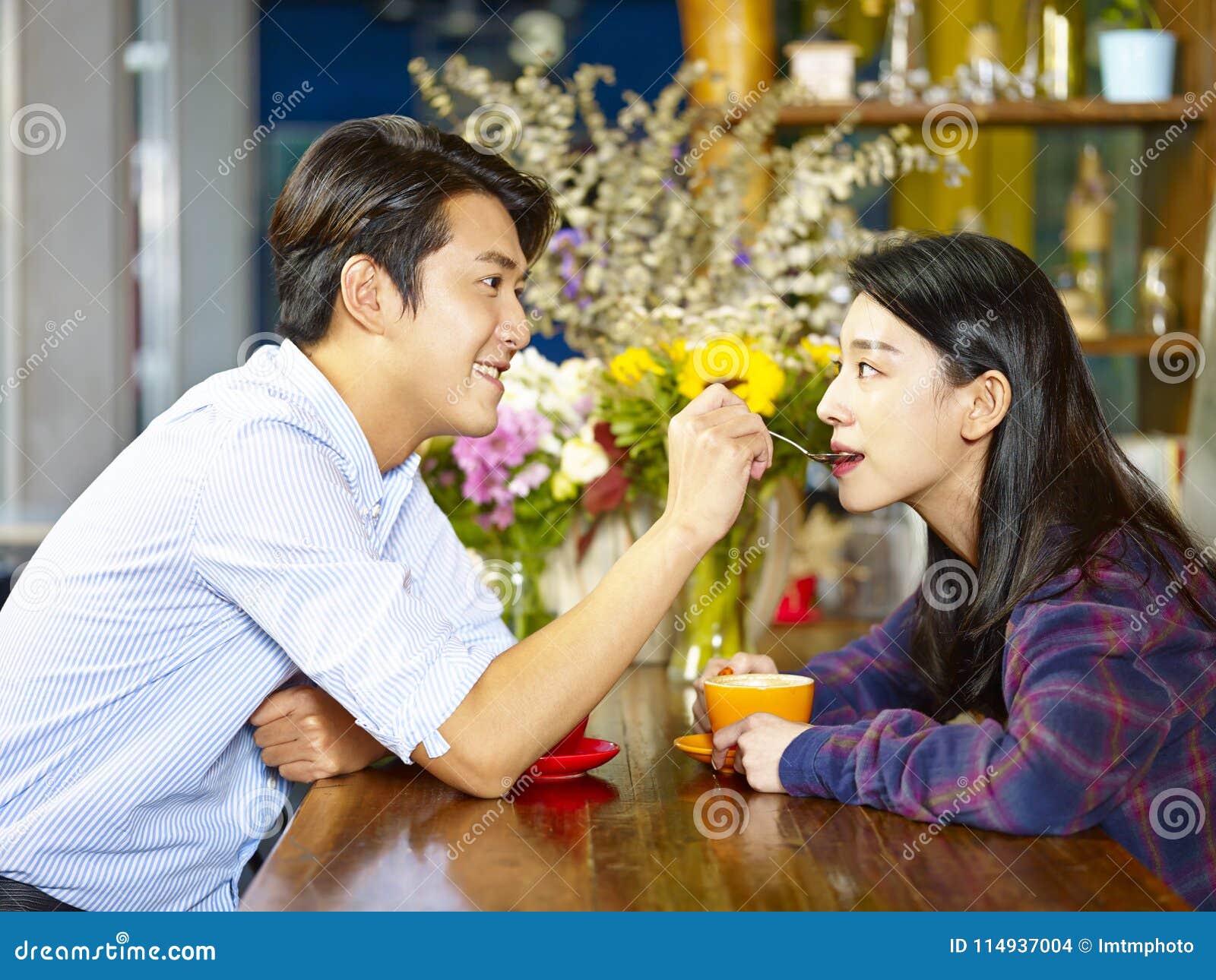 Playful Young Asian Couple in Coffee Shop Stock Photo - Image of ... Playful Young Asian Couple in Coffee Shop Stock Photo - Image of ...