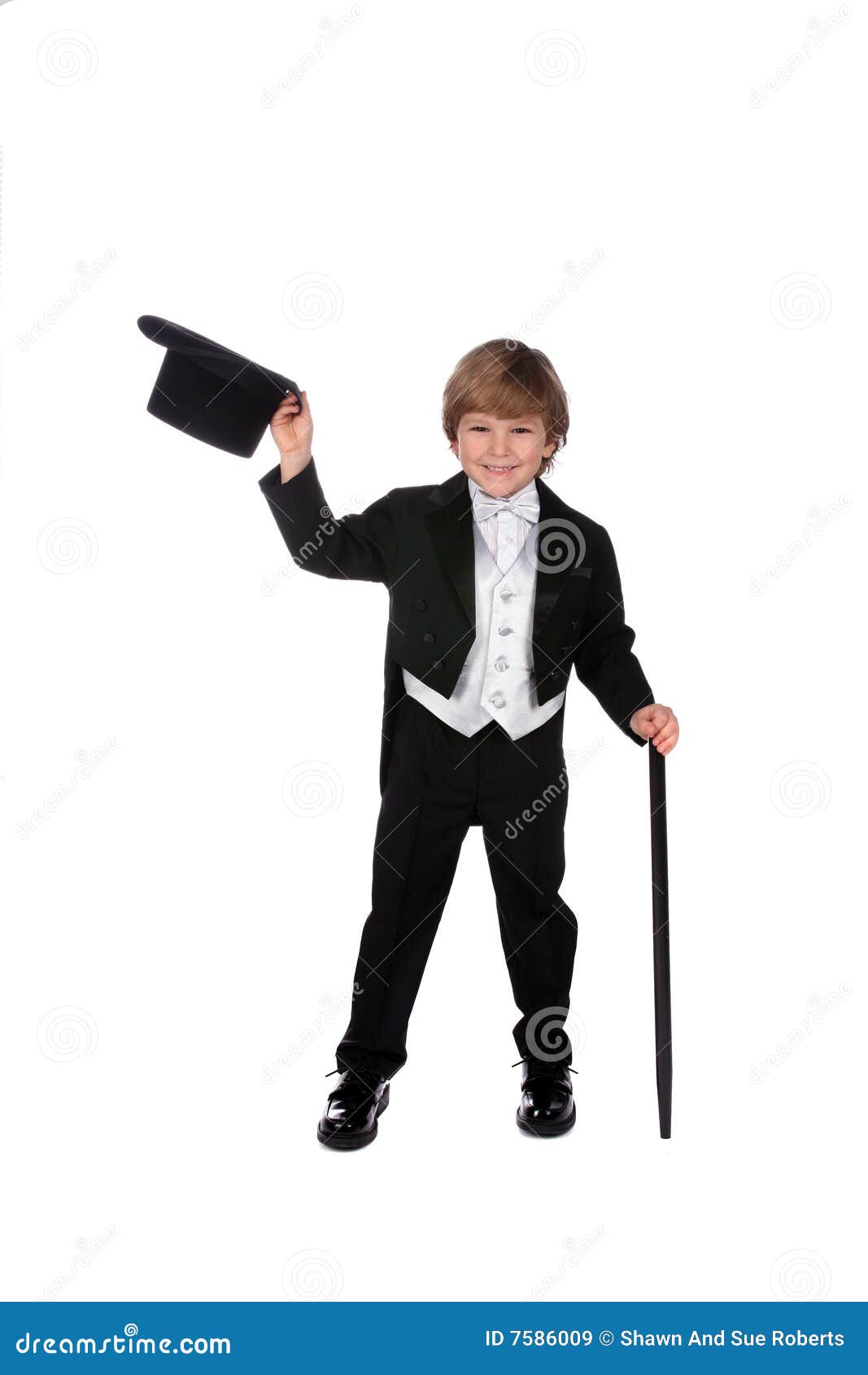Playful Young Boy In Black Tux Lifting Off His Hat Royalty-Free Stock ...