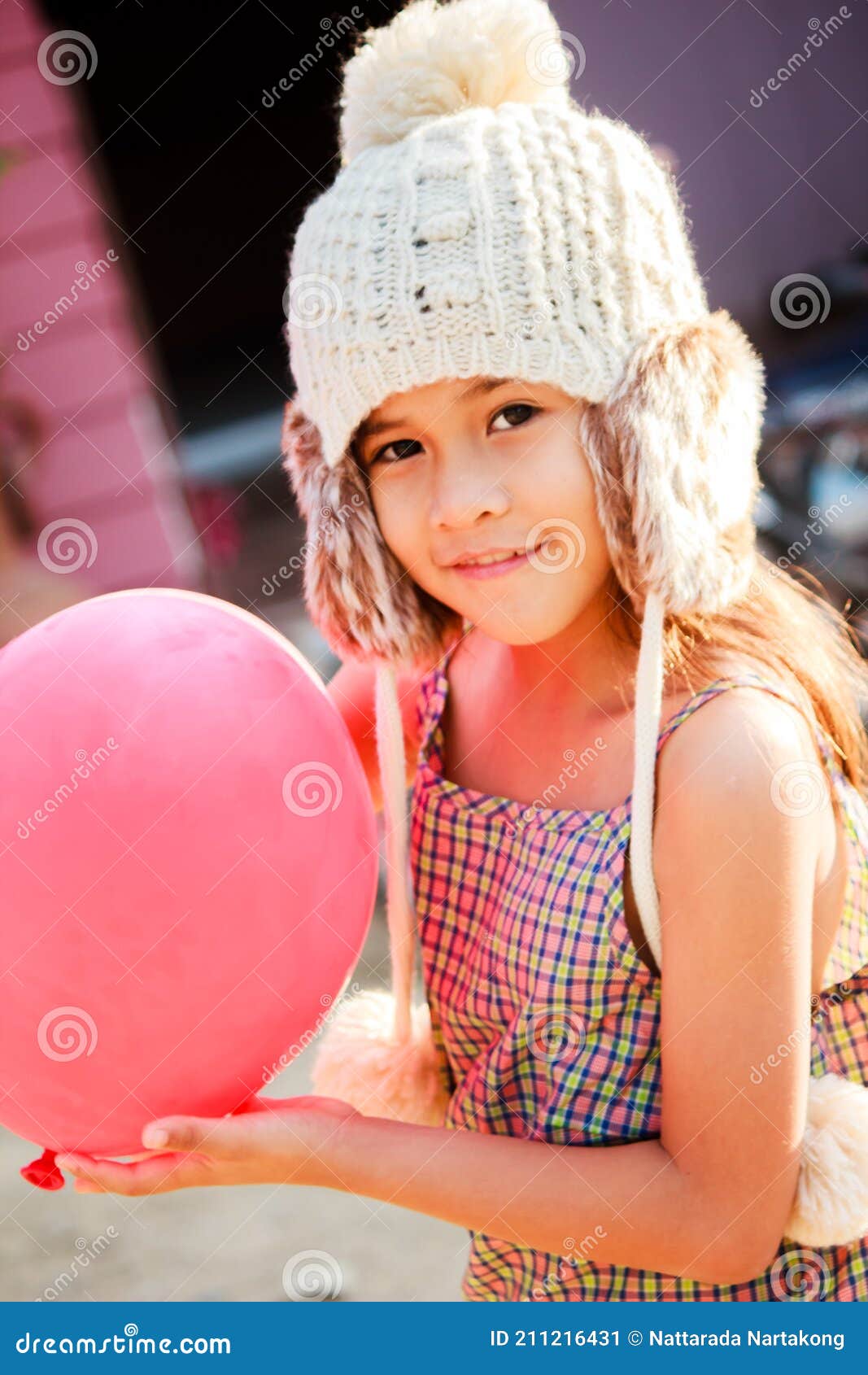 Playfully Mischievous Smile Stock Image - Image of child, balloon ...