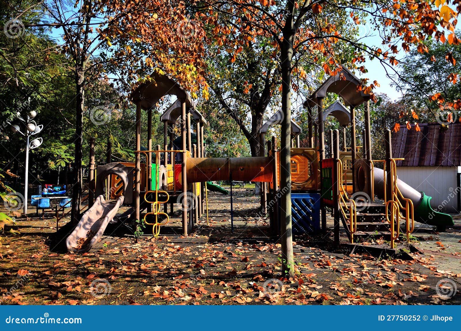 Playground stock photo. Image of young, tree, slide, yellow - 27750252