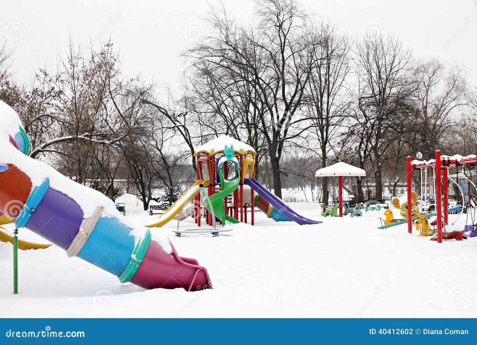 Playground covered by snow stock photo. Image of deserted - 40412602