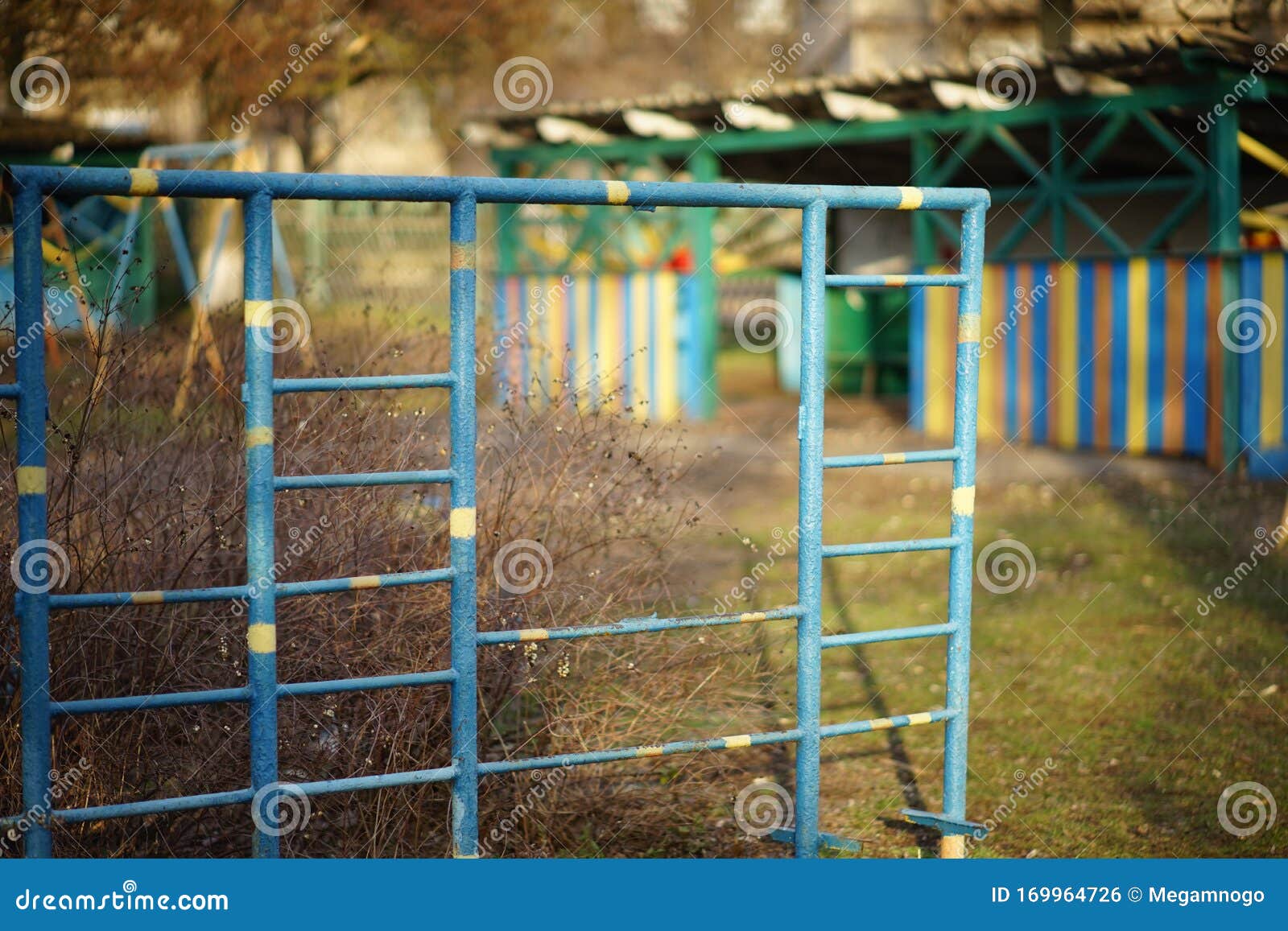 Playground with Old Metal Step Ladder Wall on the Green Grass Stock ...